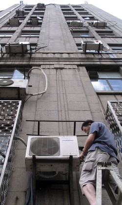 Workman Fixes Broken Airconditioning Unit On Editorial Stock Photo ...