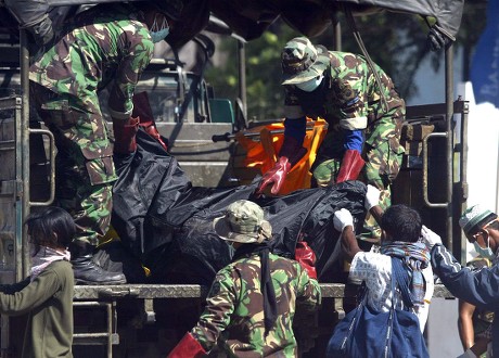 Indonesian Soldiers Load Bodies On Truck Editorial Stock Photo - Stock ...