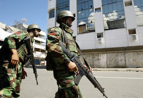 Two Indonesian Army Soldiers Hold Their Editorial Stock Photo - Stock ...