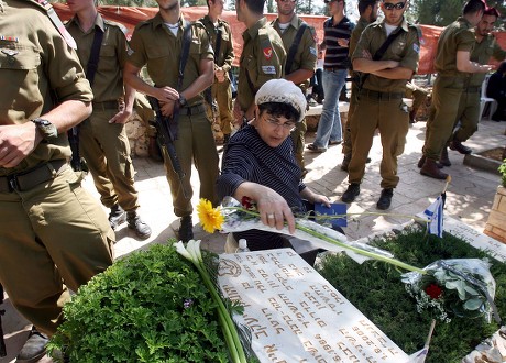 Israeli Woman Places Flower On Her Editorial Stock Photo - Stock Image ...