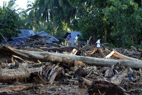 Villagers Walk On Scattered Logs Washed Editorial Stock Photo - Stock ...