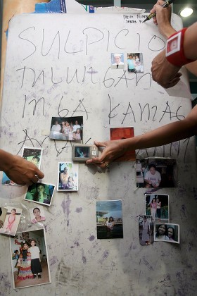 Filipino Relatives Attach Photos Passengers Sunken Editorial Stock ...