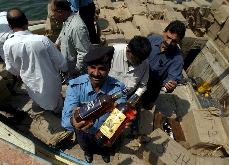Pakistani Law Enforcement Official Displays Seized Editorial Stock ...