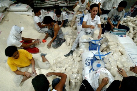 Filipino Workers Repack Rice Inside Warehouse Editorial Stock Photo ...