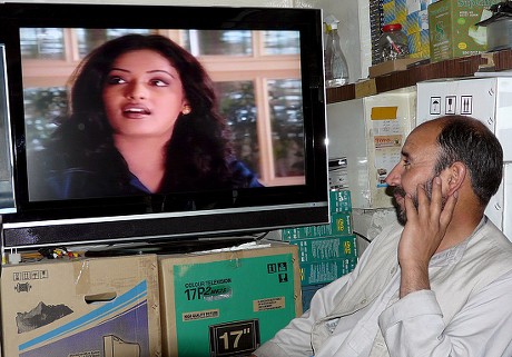 Afghan Man Watches Indian Soap Opera Editorial Stock Photo - Stock ...