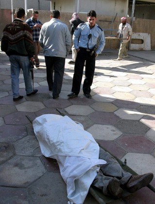 Iraqi Policemen Check Dead Body Iraqi Editorial Stock Photo - Stock ...