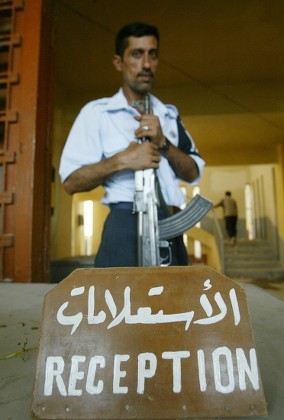 Iraqi Policeman Stands Reception Desk Police Editorial Stock Photo ...