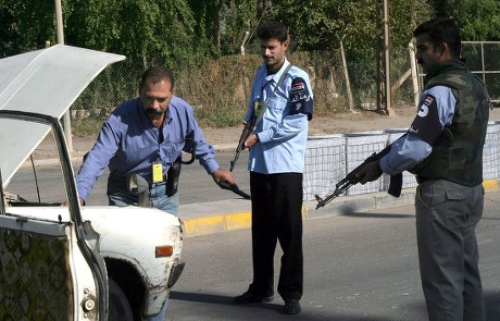 Iraqi Policemen Inspect Car Near Iraqi Editorial Stock Photo - Stock ...