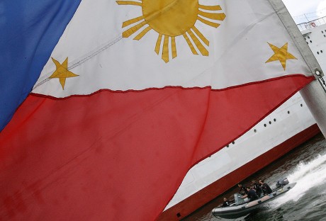 Philippine Flag Flies While Members Philippine Editorial Stock Photo ...