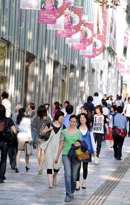 Pedestrians Walk Past Omotesando Hills Shopping Editorial Stock Photo ...