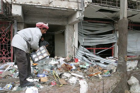 Iraqi Man Inspects Damage Outside Alrabeia Editorial Stock Photo ...