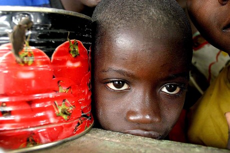 Senegalese Talibe Boy Rests On Street Editorial Stock Photo - Stock ...