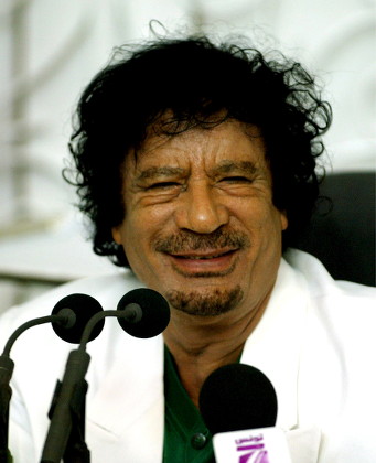 Libyan Leader Muammar Gaddafi Smiles During Editorial Stock Photo ...
