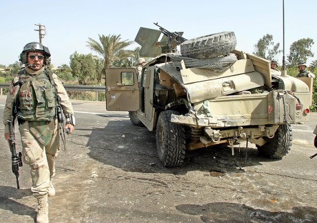 Us Soldier Passes Damaged Humvee After Editorial Stock Photo - Stock ...