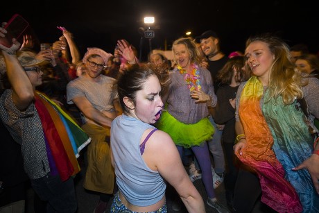 __COUNT__ LGTBQ rights activists dance outside mike Pence's home before ...