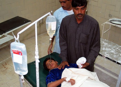 Wonded Boy Attended By Paramedic Staff Editorial Stock Photo - Stock ...