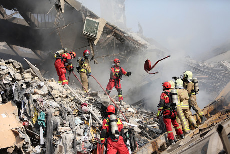 Iranian Firefighters Work On Collapsed Commercial Editorial Stock Photo ...
