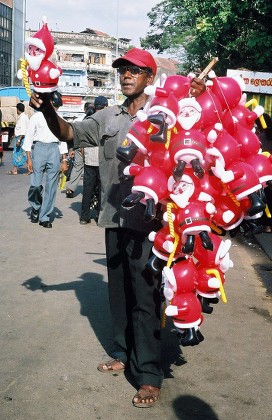 Pavement Hawker Sells Inflated Rubber Santas Editorial Stock Photo ...