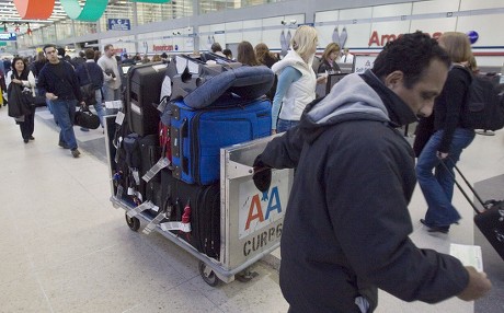 Skycap Pulls Cart Loaded Luggage Passengers Editorial Stock Photo ...