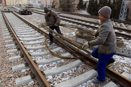 Two Railroad Workers Carry Reinforcing Steel Editorial Stock Photo ...