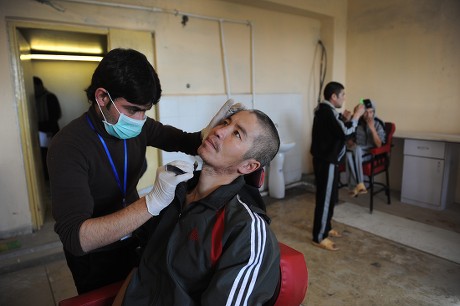 Afghan Man Shaves Drug Addict Camp Editorial Stock Photo - Stock Image ...