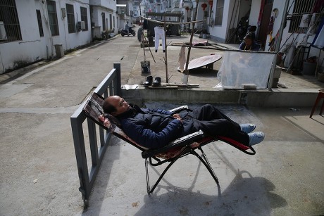 Chinese Villager Takes Nap Outside His Editorial Stock Photo - Stock ...