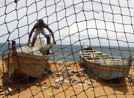 Ivorian Fisherman Prepares His Fishing Nets Editorial Stock Photo ...
