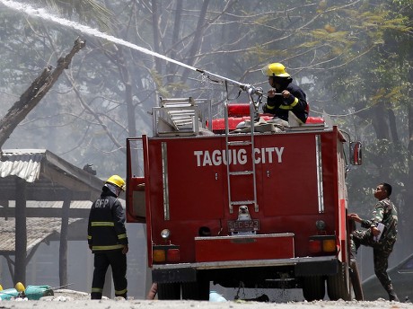 Filipino Firemen Work Extinguish Blaze Following Editorial Stock Photo ...