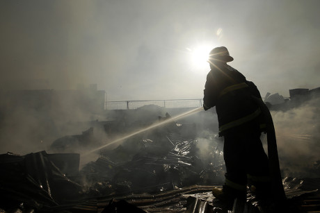 Filipino Fireman Uses Water Extinguish Remaining Editorial Stock Photo ...