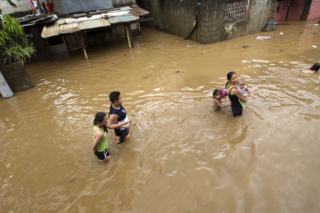 Filipino Flood Victims Wade Through Water Editorial Stock Photo - Stock Image | Shutterstock
