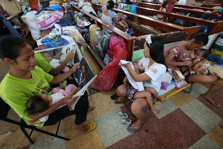 Filipino Typhoon Victims Tend Their Children Editorial Stock Photo ...