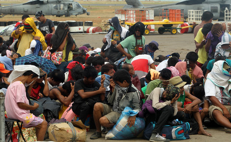 Filipino Typhoon Victims Cover Their Face Editorial Stock Photo - Stock ...