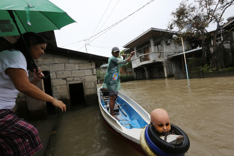 Filipino Flood Victim Embarks On Boat Editorial Stock Photo - Stock ...