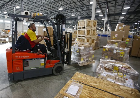 Dhl Warehouse Employee Moves Cargo During Editorial Stock Photo - Stock ...