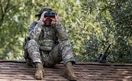 Law Enforcement Sniper Looks Through His Editorial Stock Photo - Stock ...