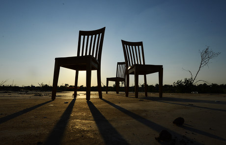 Three Chairs Sit On Concrete Slab Editorial Stock Photo - Stock Image ...