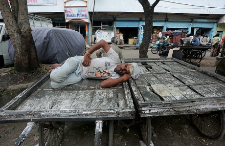 Indian Labourer Rests On Road Side Editorial Stock Photo - Stock Image ...