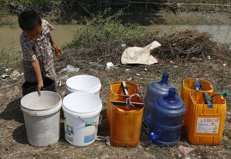 Child Puts Water Bucket Lined Buckets Editorial Stock Photo - Stock ...
