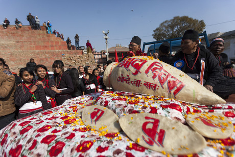 Nepalese Newari Men Hold Giant Yomari Editorial Stock Photo - Stock ...