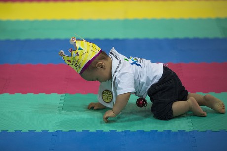 Child Crawls On Mat During Baby Editorial Stock Photo - Stock Image ...