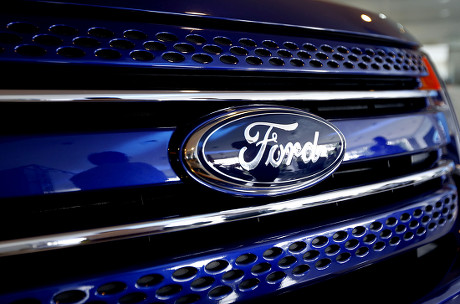 Visitors Cast Shadows On Logo Ford Editorial Stock Photo - Stock Image ...