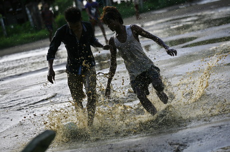 Two Young Men Splash Around Playing Editorial Stock Photo - Stock Image ...