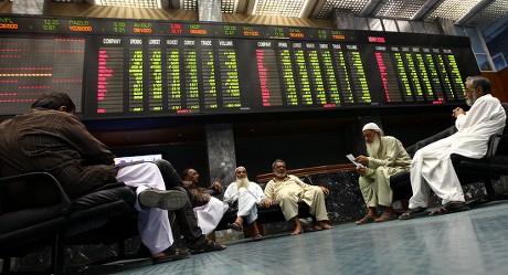Pakistani Traders Sit Beneath Electronic Display Editorial Stock Photo ...