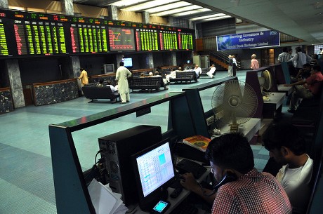 Pakistani Traders Monitor Trade Prices Karachi Editorial Stock Photo ...