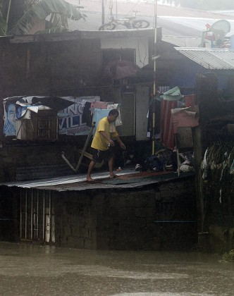 Filipino Resident Secures Belongings On Roofs Editorial Stock Photo ...