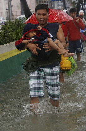 Filipino Carries His Child Along Flooded Editorial Stock Photo - Stock ...