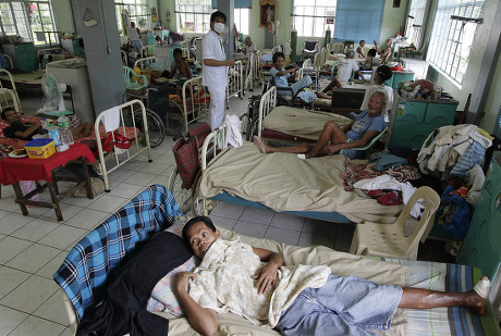 Filipino Nurse Standing Oversees Patients Who Editorial Stock Photo ...