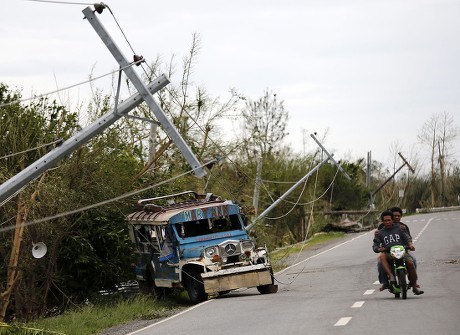 Filipinos On Motorcycle Maneuver Past Toppled Editorial Stock Photo ...
