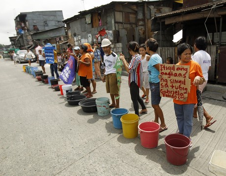 Filipino Residents Stand Behind Water Containers Editorial Stock Photo ...