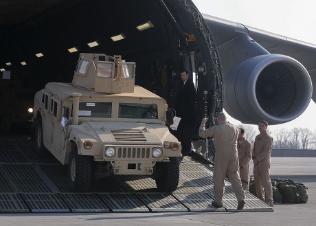 Plane Crew Members Help Unload Hmmwv Editorial Stock Photo - Stock ...